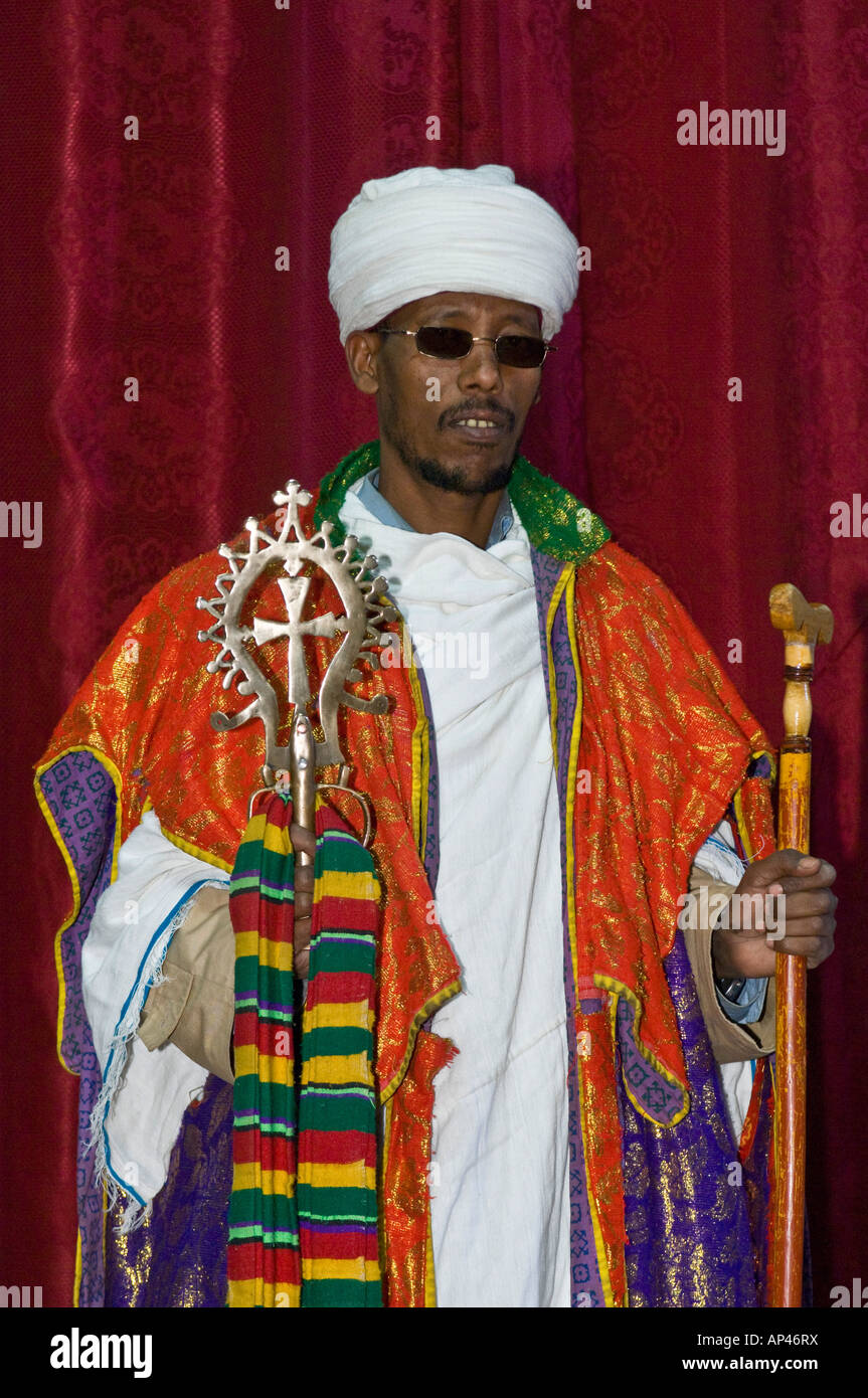 A priest poses for the camera in the Bete Medhane Alem mononlithic ...