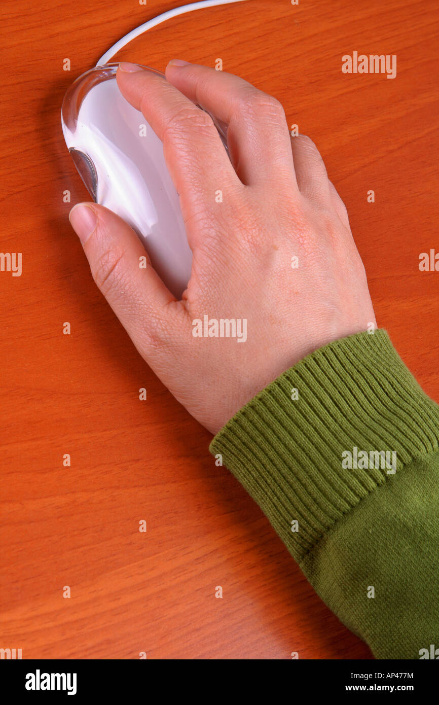 Business woman using computer mouse Stock Photo - Alamy