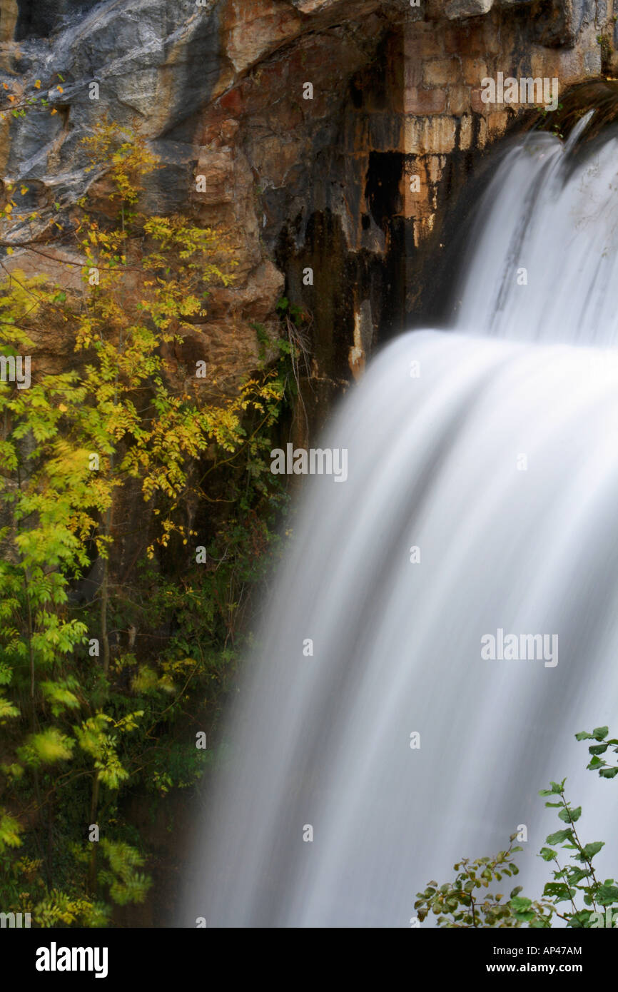 Waterfall detail in autumn season Stock Photo - Alamy