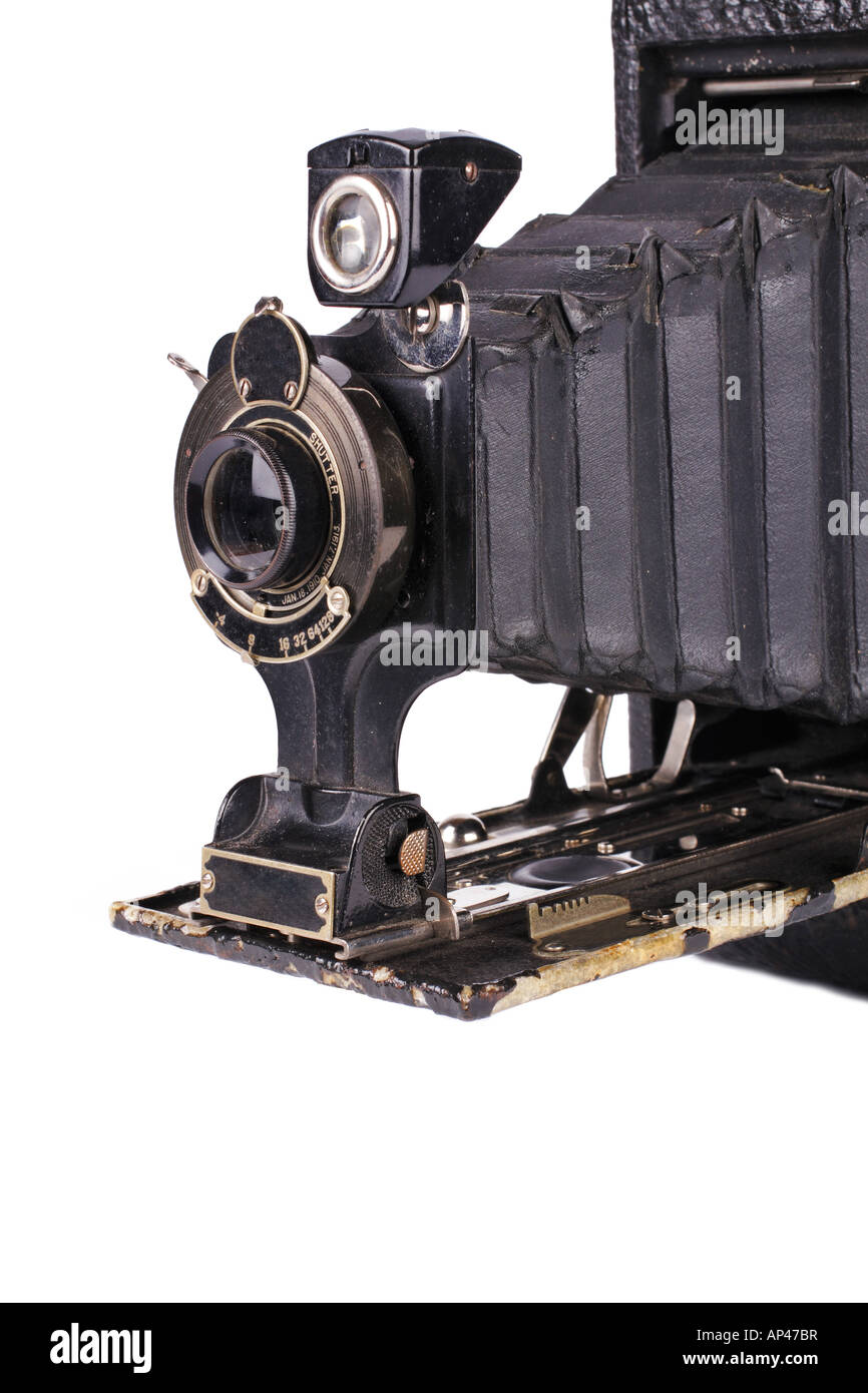 Antique folding camera over a white background Stock Photo - Alamy