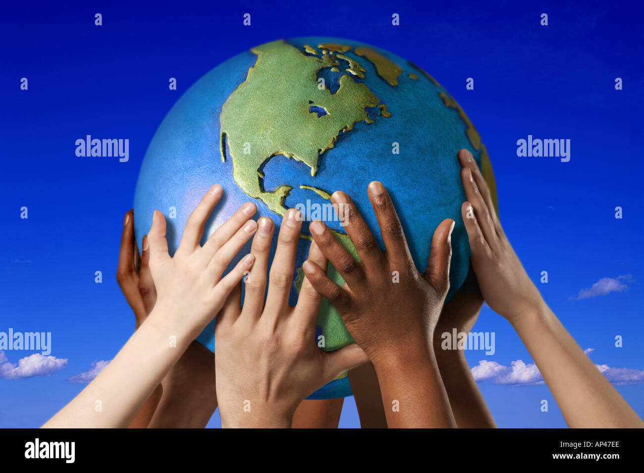 Hands on a globe Stock Photo - Alamy
