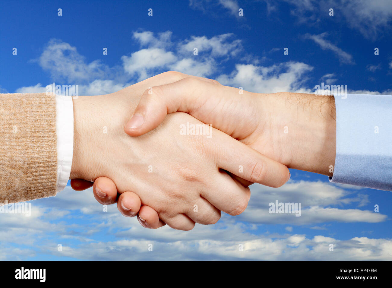 Business handshake over a sky background Stock Photo - Alamy