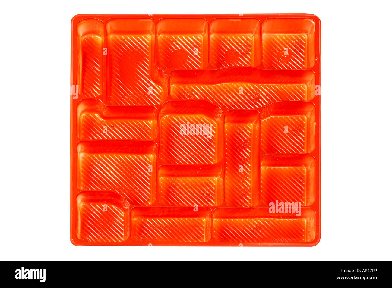 Red wrapper of plastic empty over a white background Stock Photo - Alamy