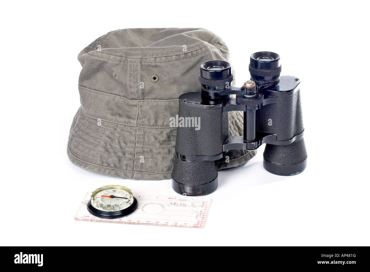 Hat compass and binoculars on a white background Stock Photo - Alamy