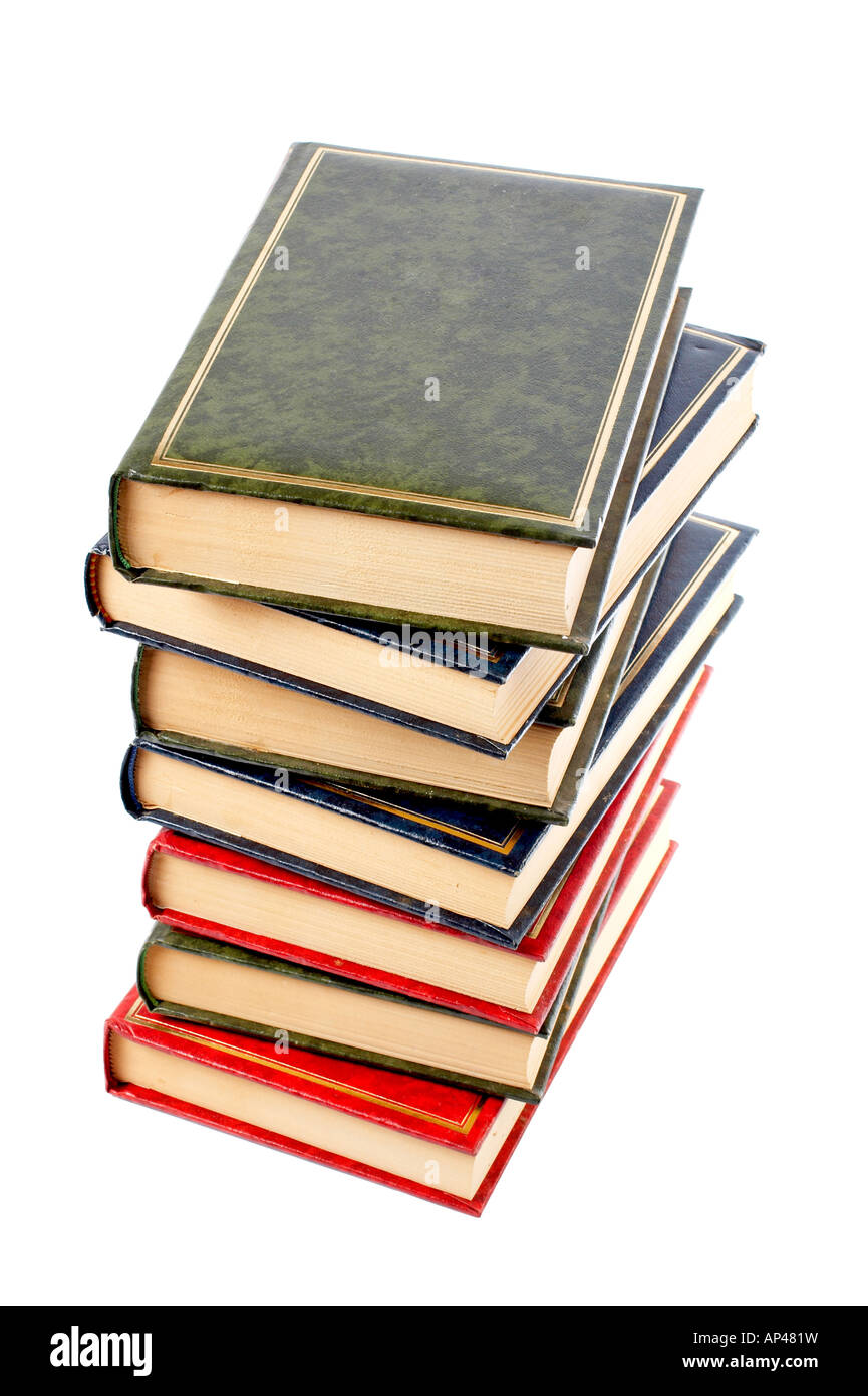 A vertical pile of books isolated on white background Stock Photo - Alamy