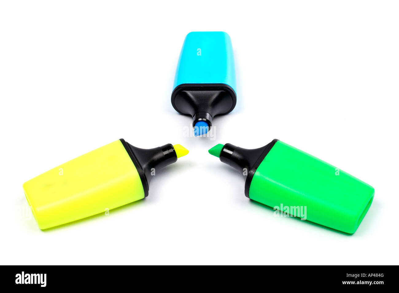 Assortment of three coloured labellers with shadow on white background ...