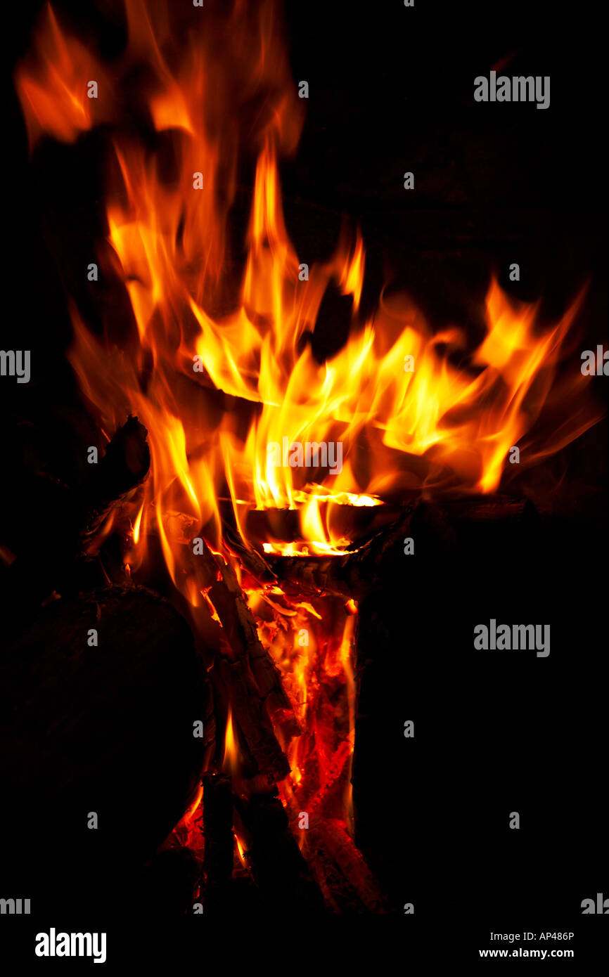 Vertical close up of flames and fire on a black background Stock Photo ...