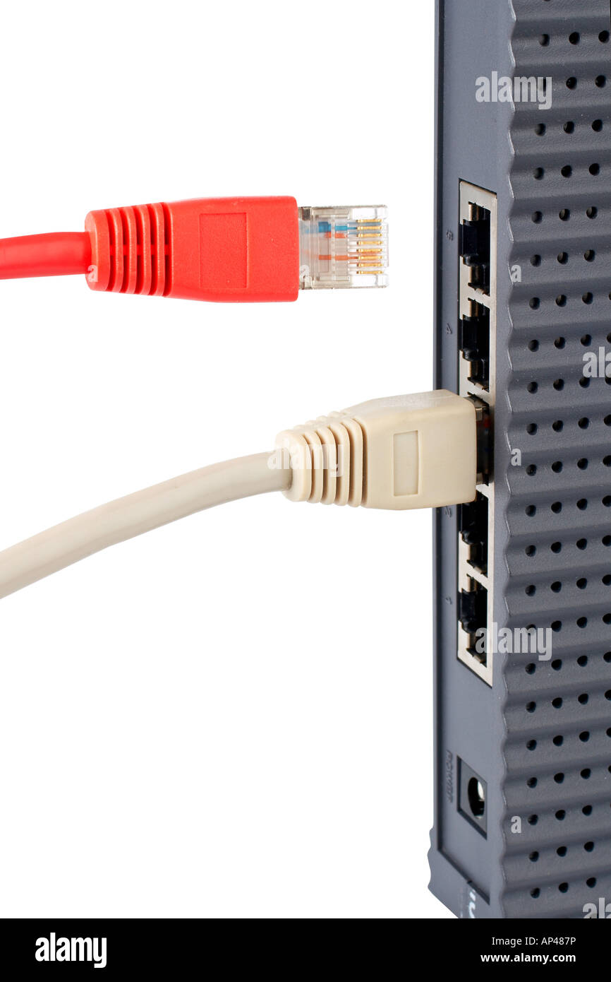 Red cable plugin on the router on white background Stock Photo - Alamy