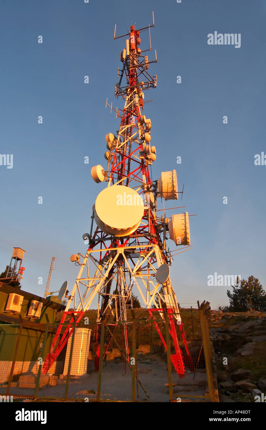 Parabolic antennas tower in winter sunrise Stock Photo - Alamy