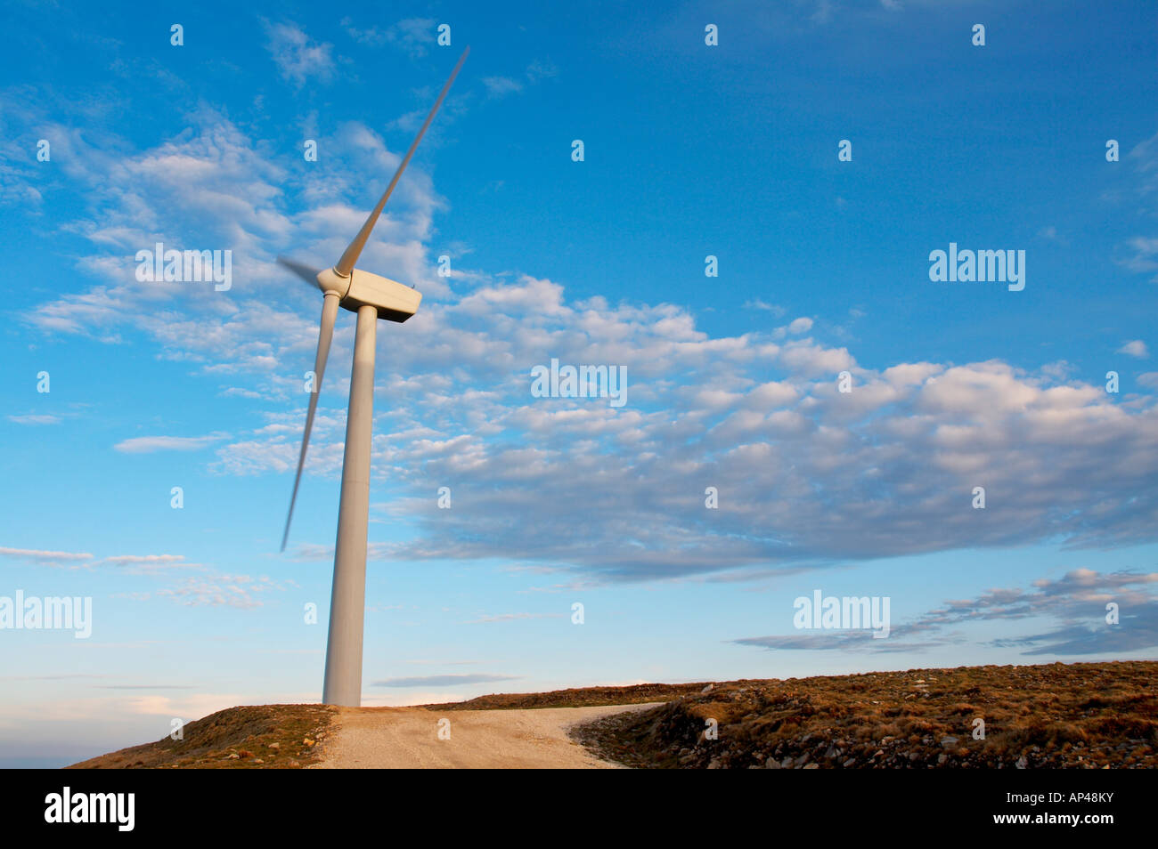 Windmill turning on the sunset in winter Stock Photo - Alamy