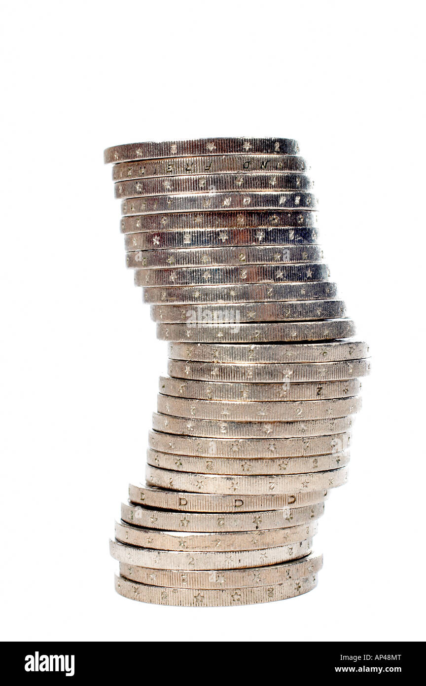 Vertical stack of coins on white background Stock Photo - Alamy