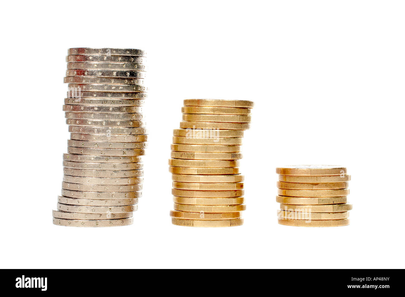 Vertical stacks of coins on white background Stock Photo - Alamy