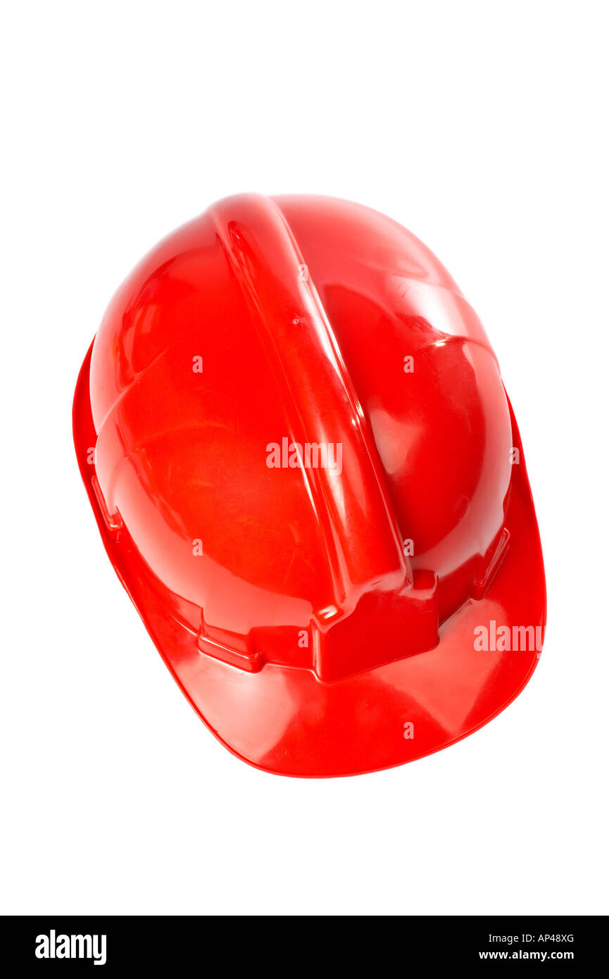 Plastic red hard hat on white background Stock Photo - Alamy