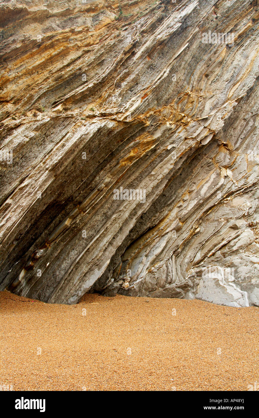 Multiple layers of eroded cliff in a beach Stock Photo - Alamy