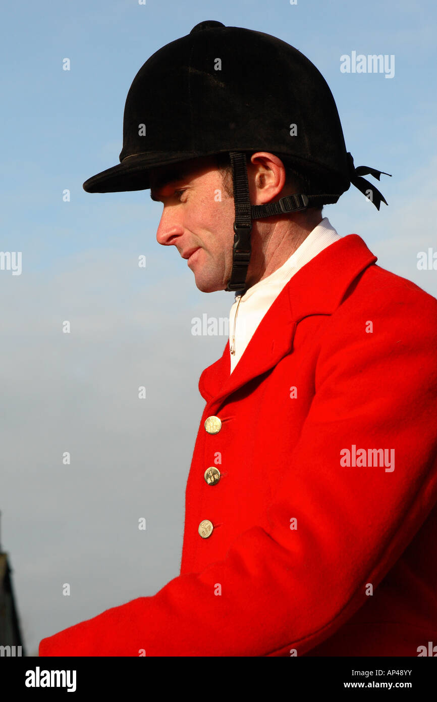 Fox hunting hunter rider wearing scarlet jacket in Somerset England ...