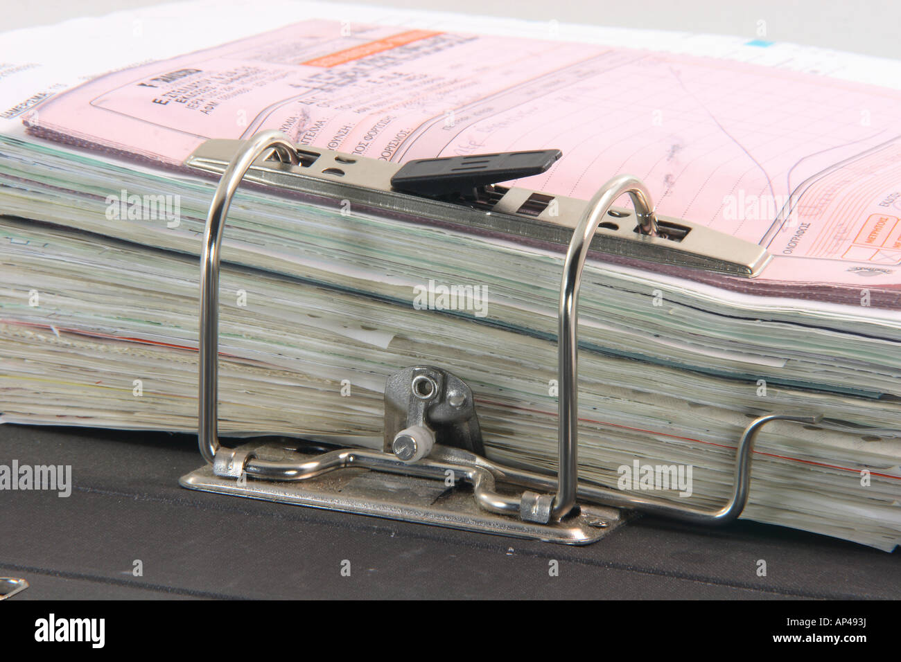 detail from open archive business folder with binders Stock Photo - Alamy