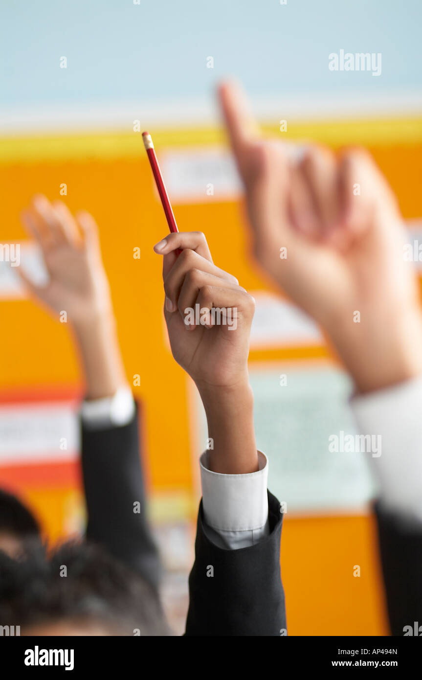 children with hand up Stock Photo - Alamy