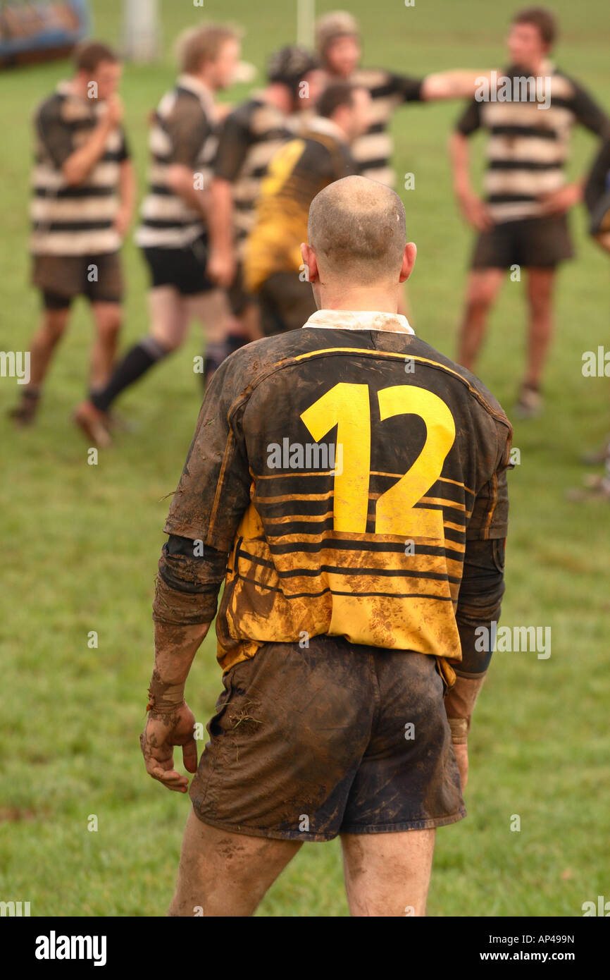 Rugby game match player 12 twelfth man muddy sport Stock Photo - Alamy