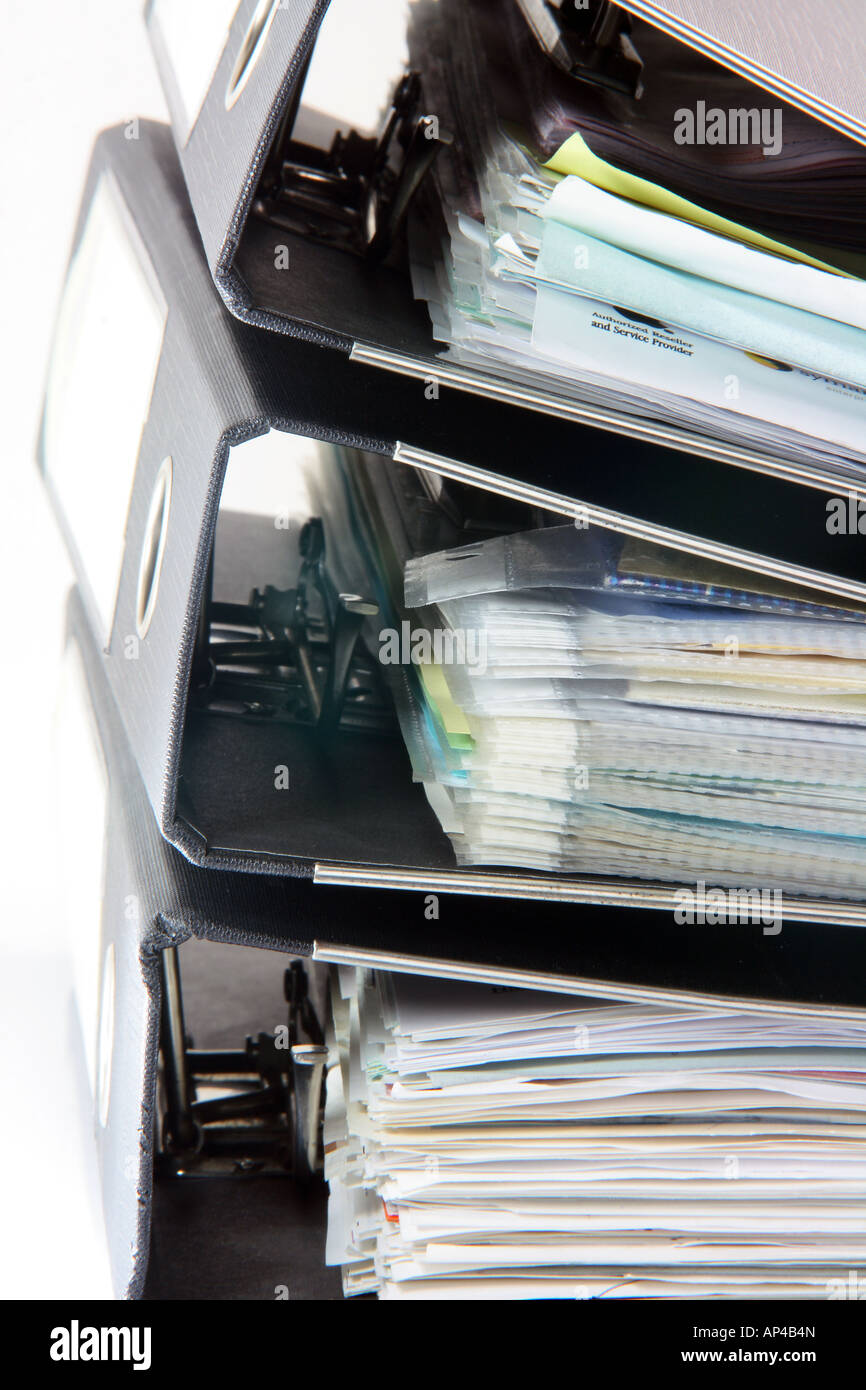detail from stack of three black business folders on white Stock Photo ...