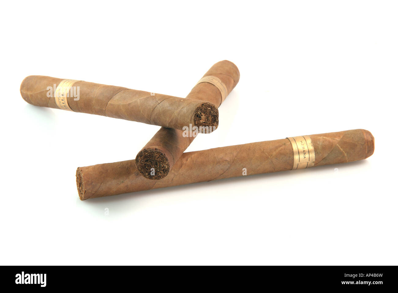 three large cuban cigars isolated on white background luxury and abuse ...
