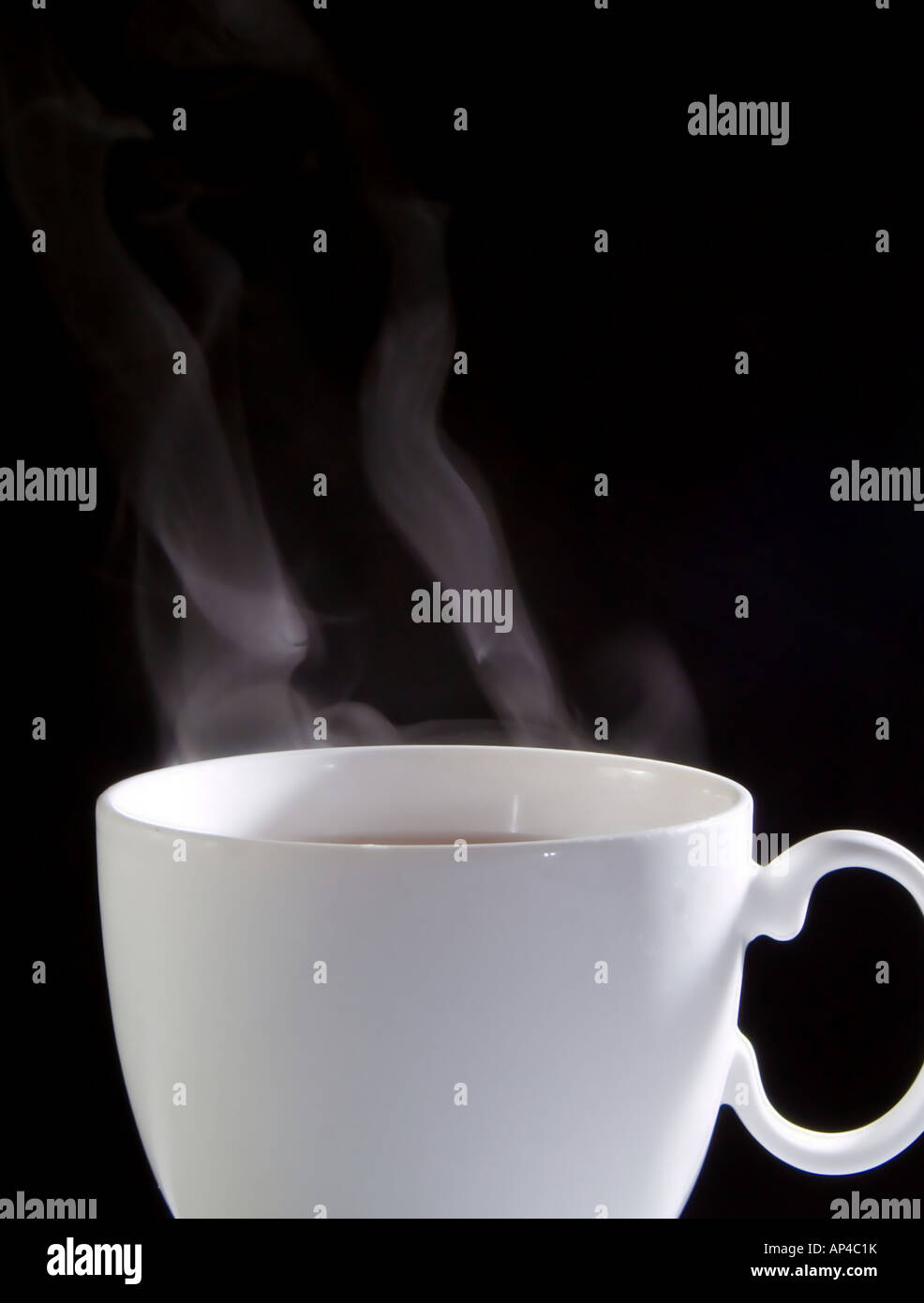 Coffee cup with smoke Stock Photo - Alamy