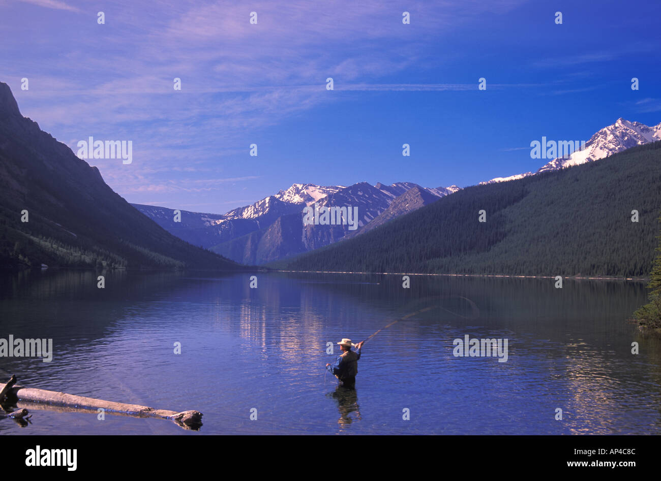 Fly fishing on a scenic lake Stock Photo - Alamy