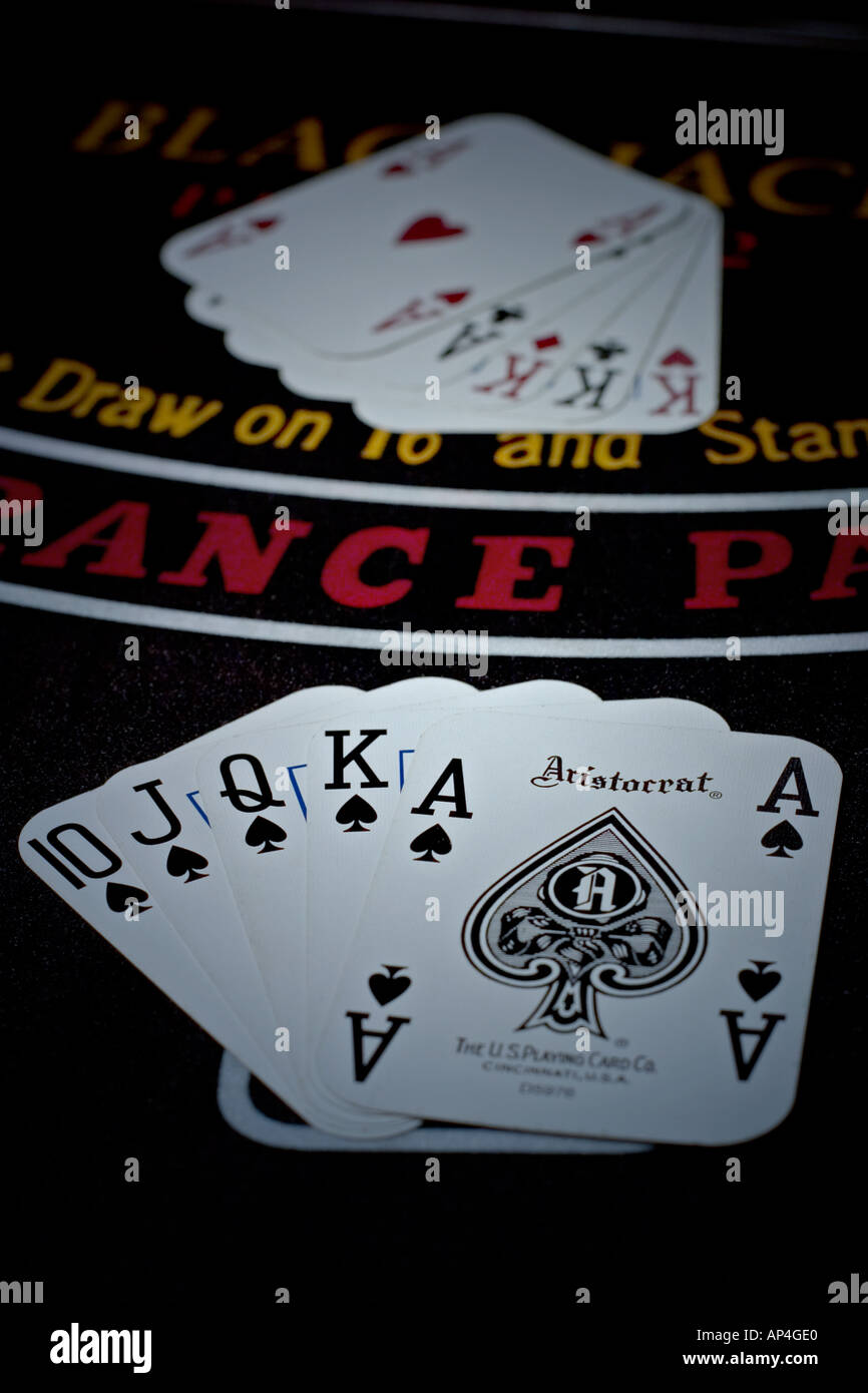 Royal flush poker hand Stock Photo - Alamy