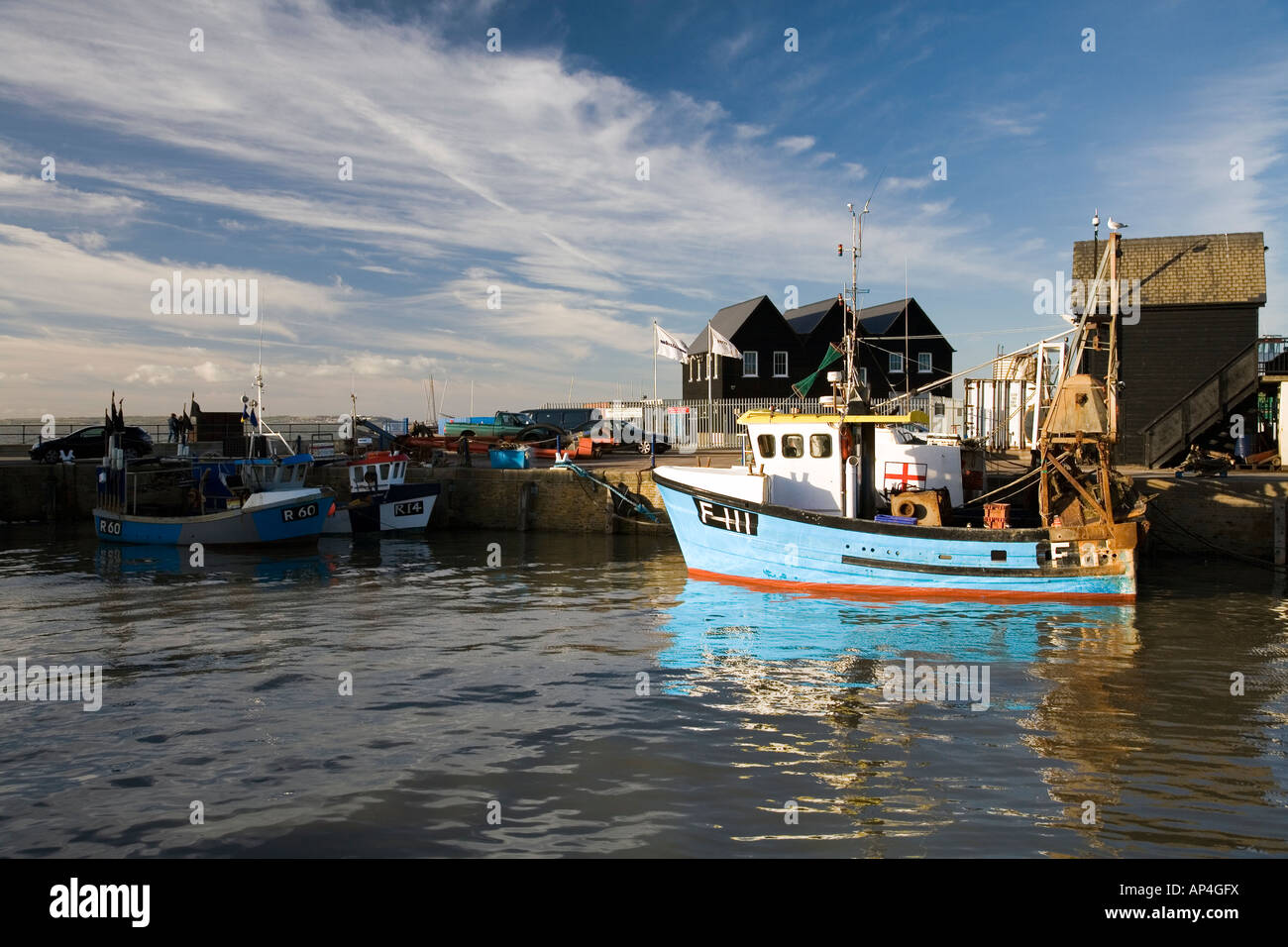 Fishing boat in Whitstable Harbour Stock Photo - Alamy