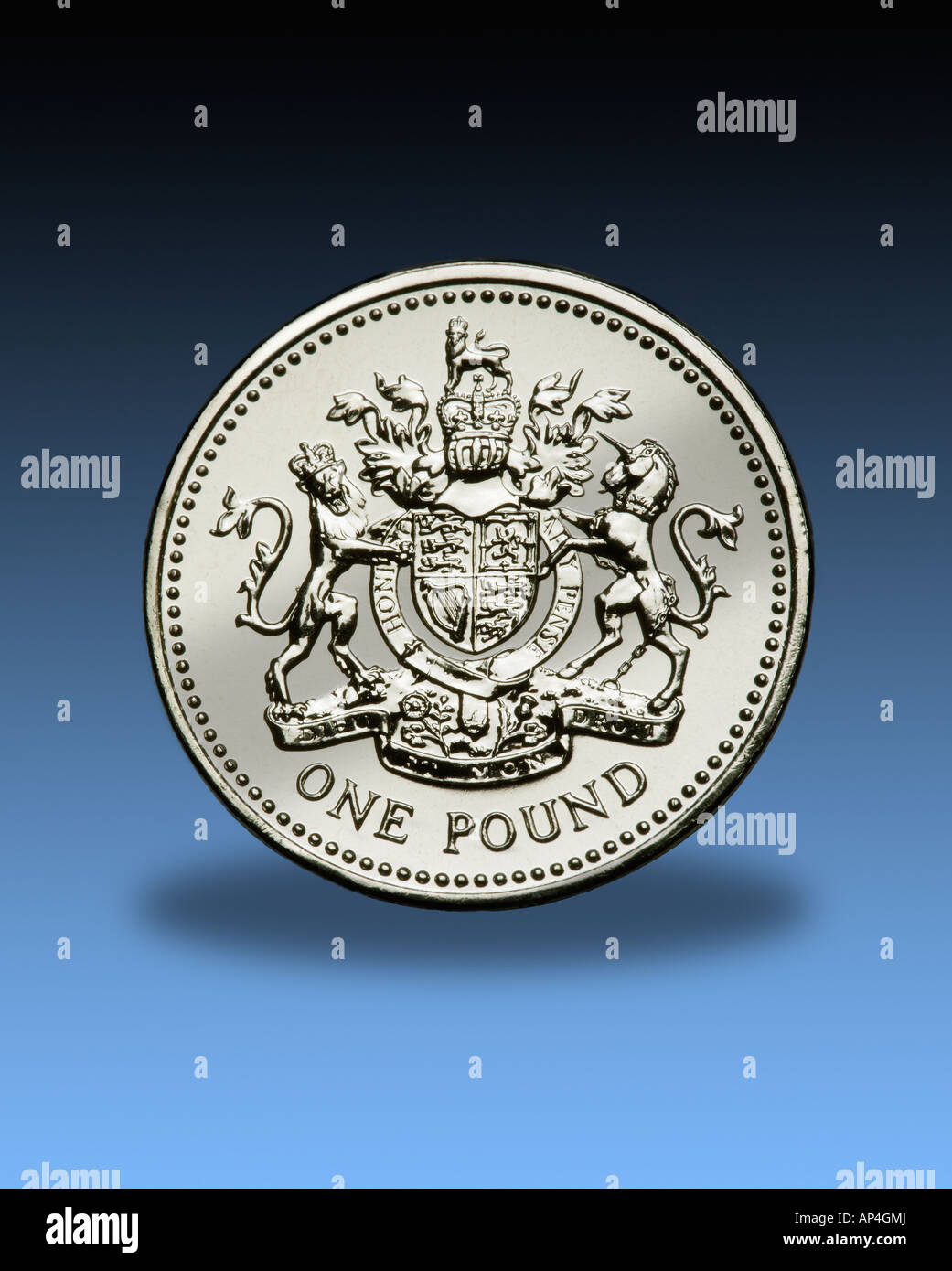 Pound coin on black to blue blended background Stock Photo - Alamy