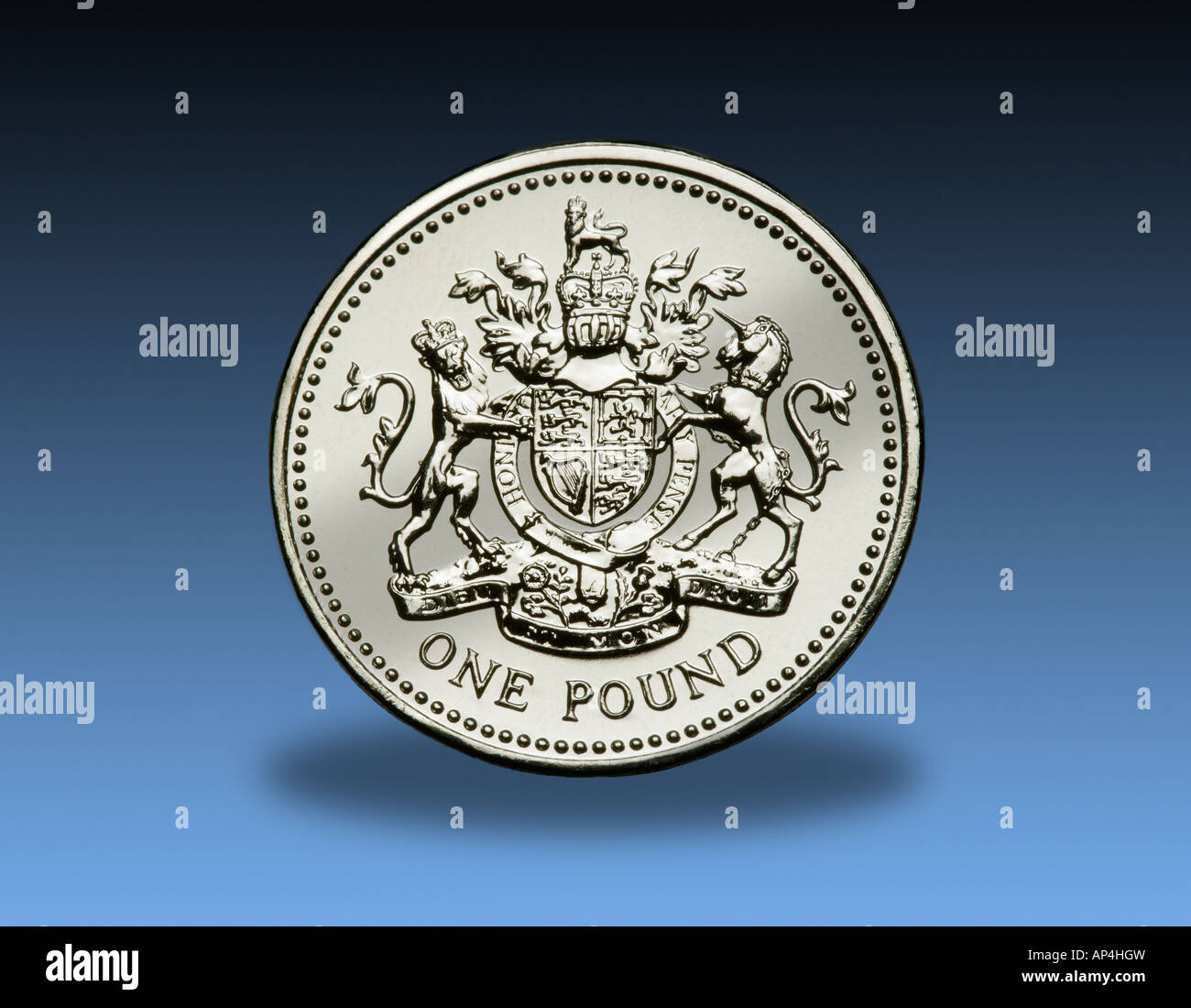 Pound Coin on black to blue blended background Stock Photo - Alamy