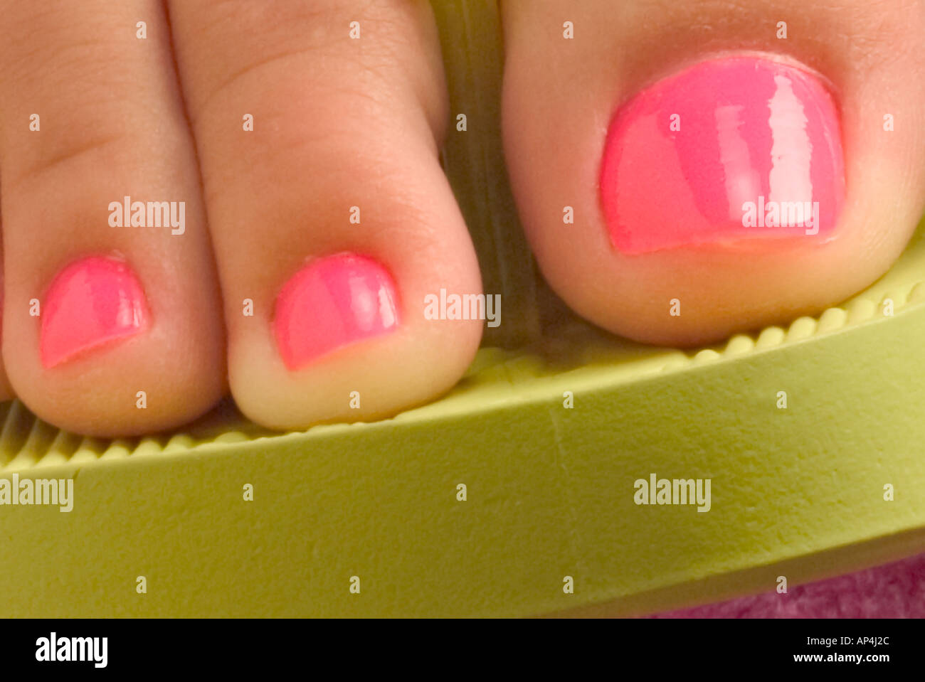 Pink toe nails hi-res stock photography and images - Alamy