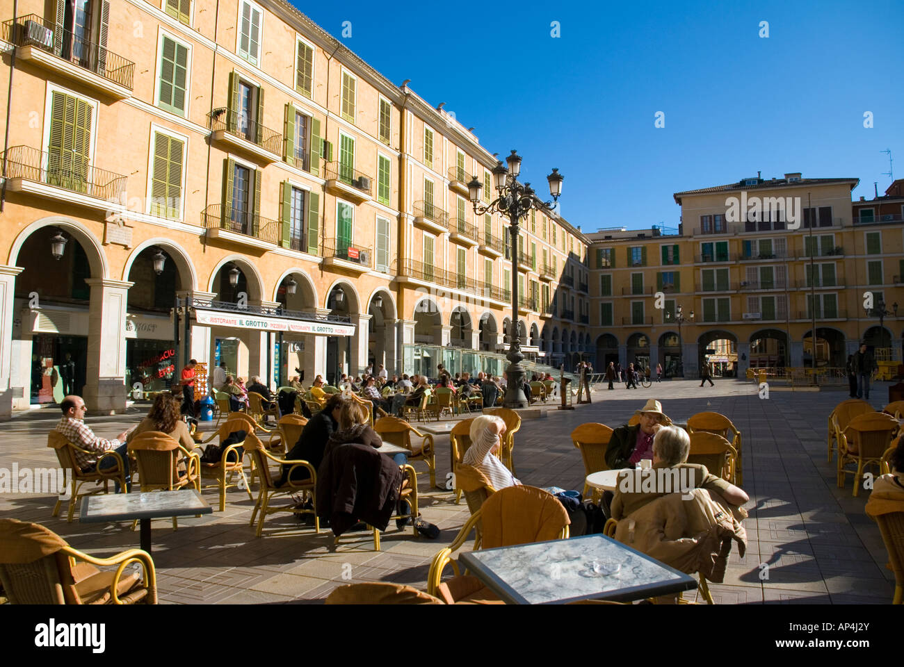 Palma Mallorca Spain Tourists and locals relax in Plaza Mayor a large ...