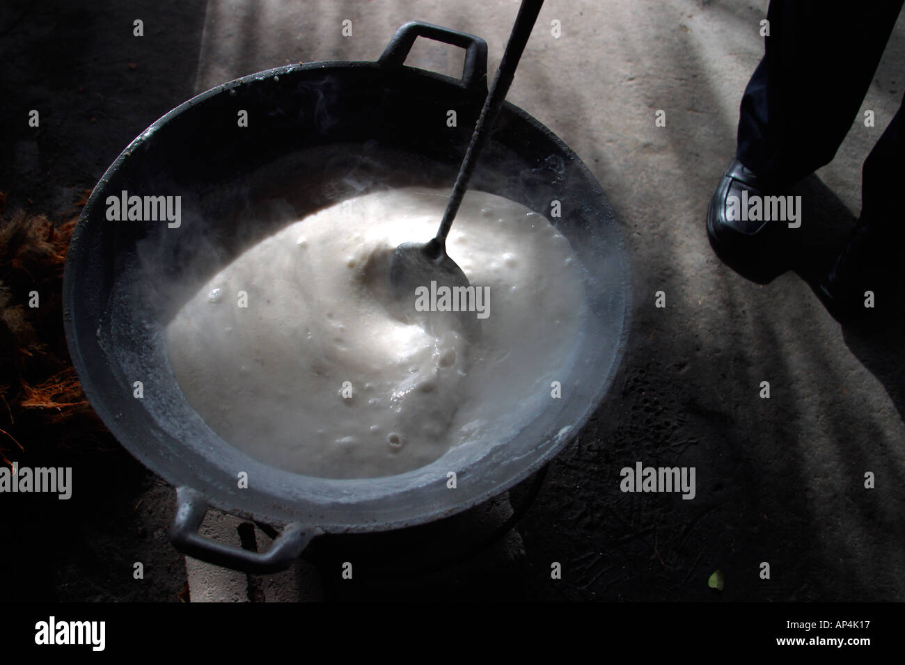 Boiling the coconut seeds Thailand Stock Photo - Alamy