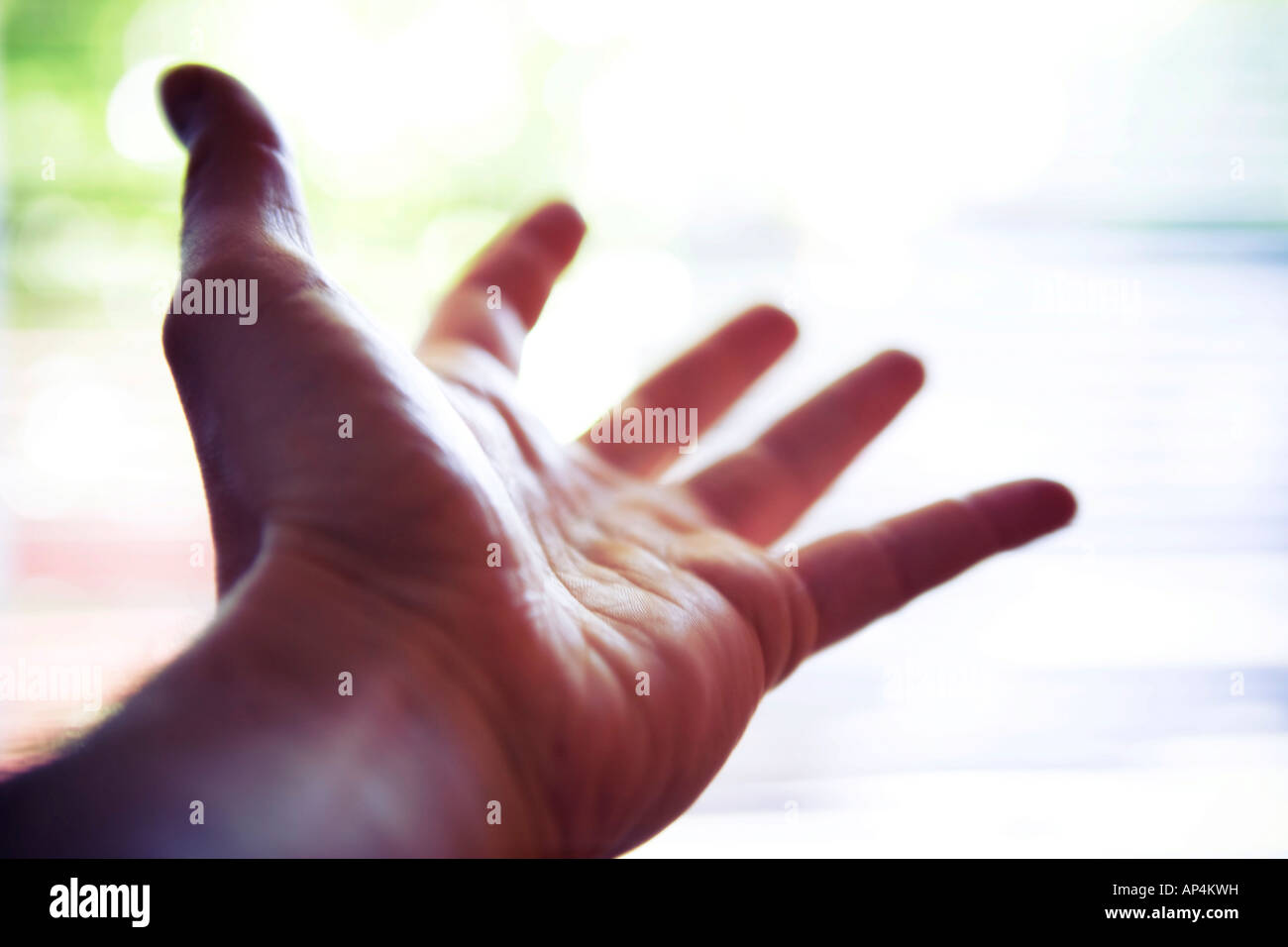 hand reaching the light Stock Photo - Alamy