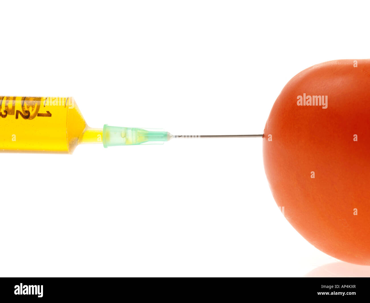 Injecting a Tomato Stock Photo - Alamy