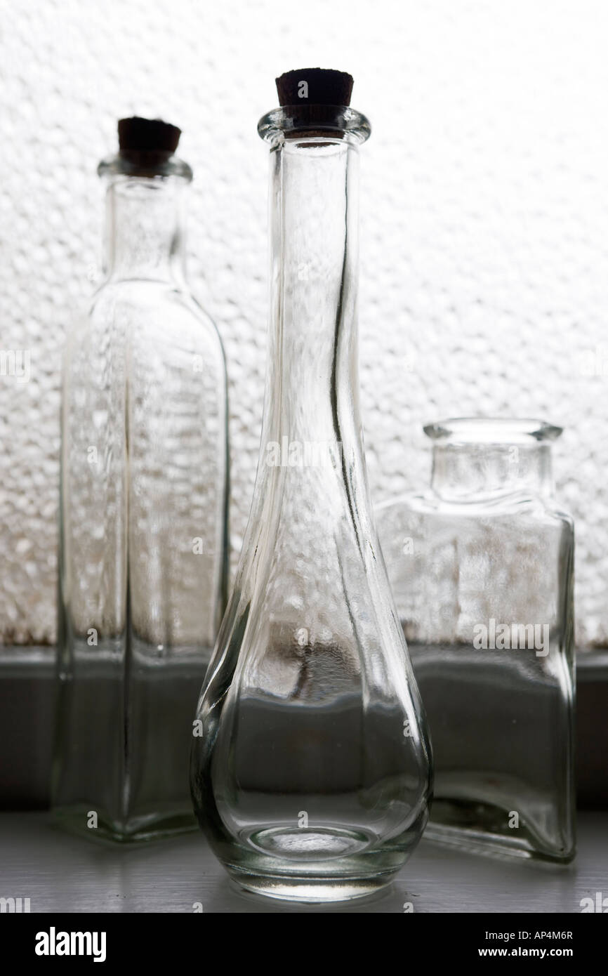empty fancy glass bottles Stock Photo - Alamy