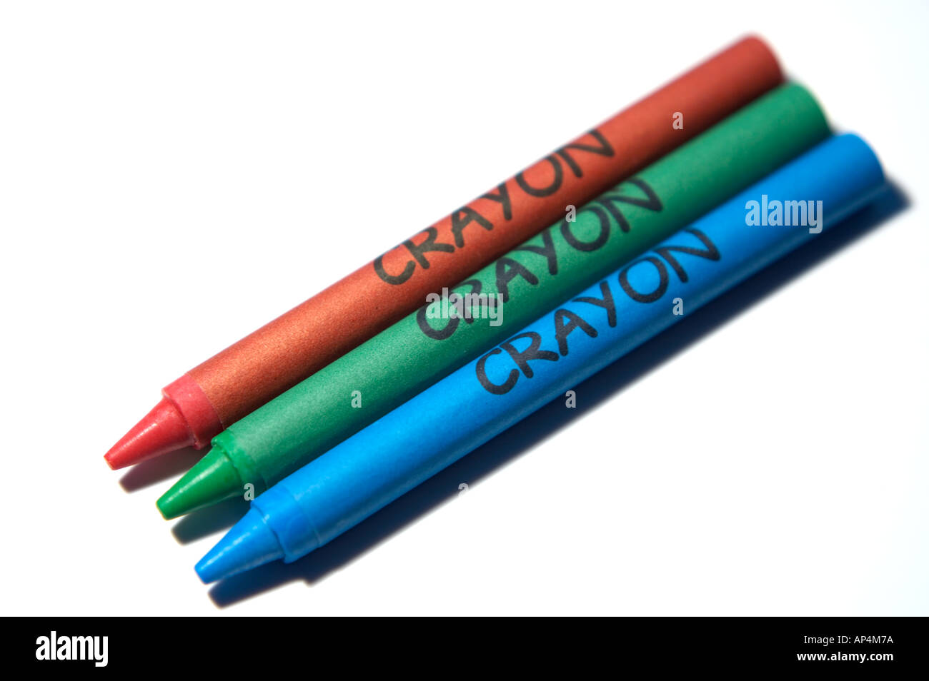 Triple of Red Green and Blue crayons arranged on white background Stock Photo - Alamy