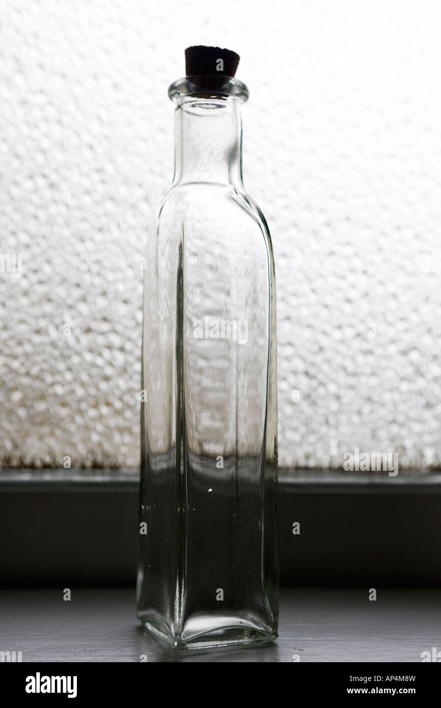 empty fancy glass bottles Stock Photo - Alamy