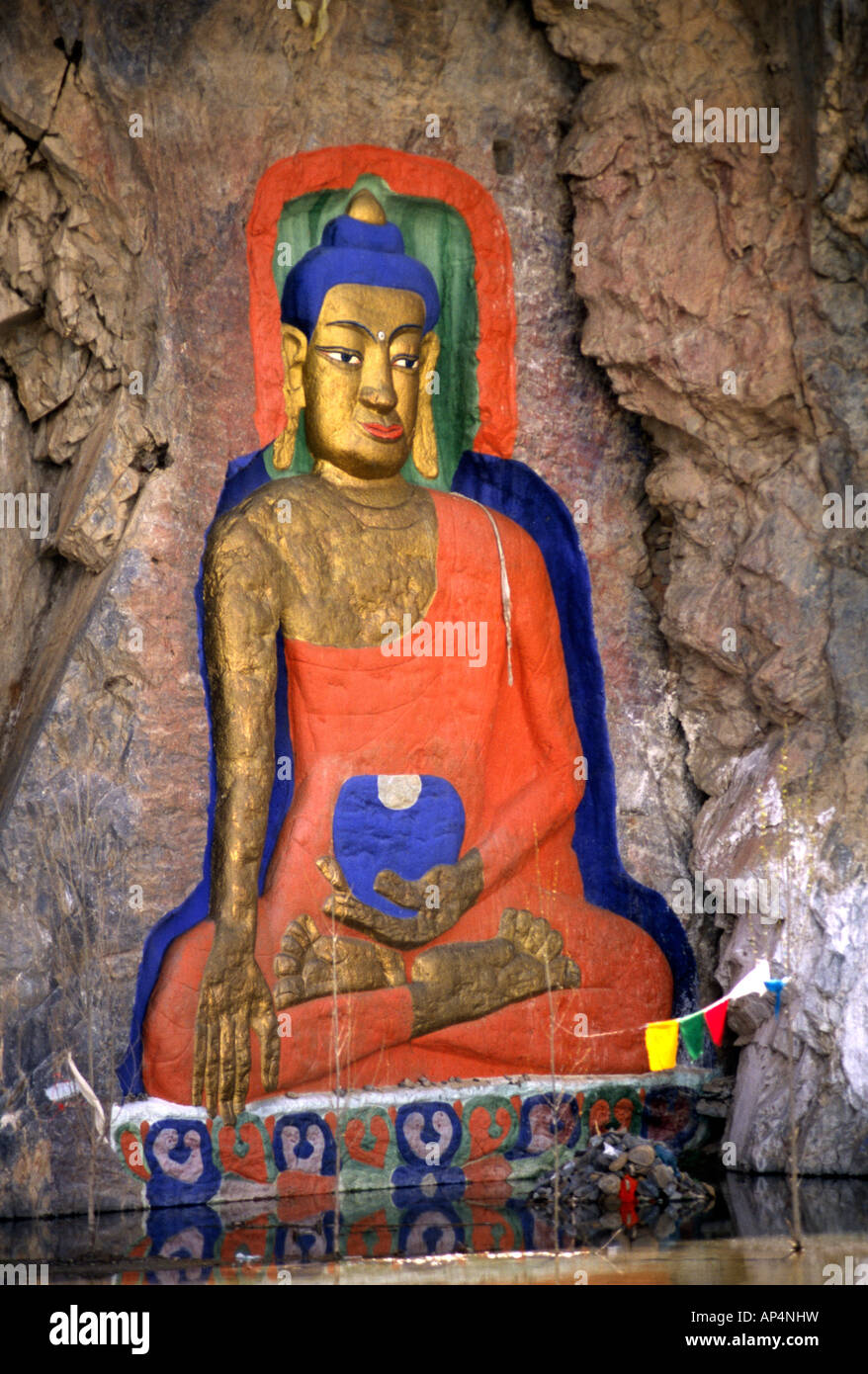 An 11th century SHAKYAMUNI BUDDHA is carved out of a stone cliff near ...