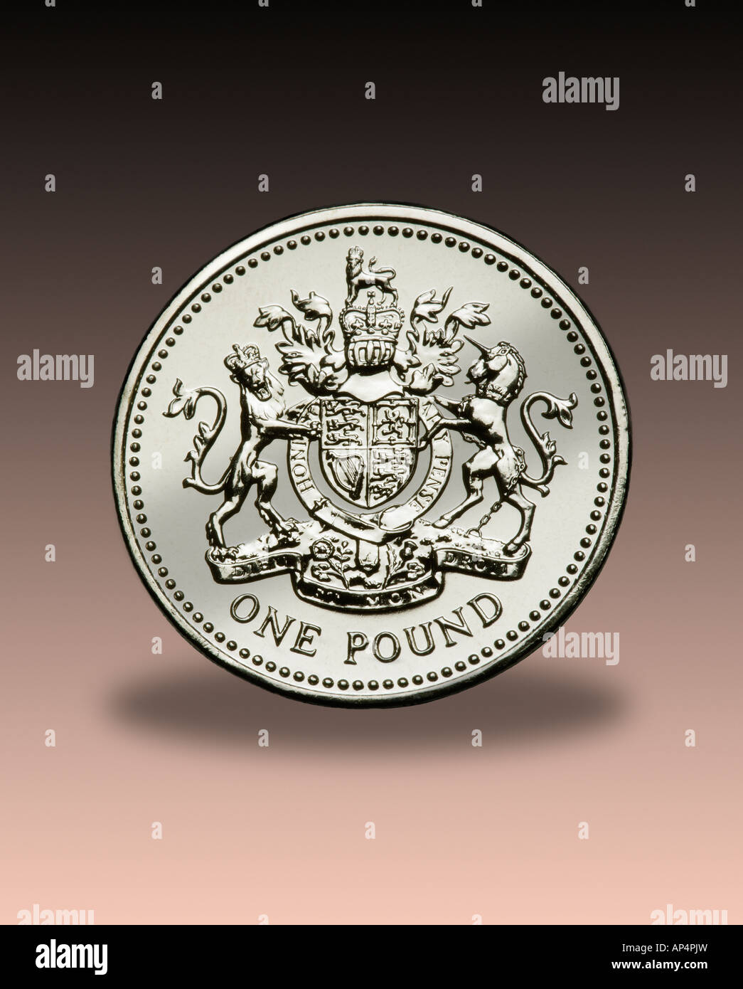 Pound coin on black to pink blended background Stock Photo - Alamy