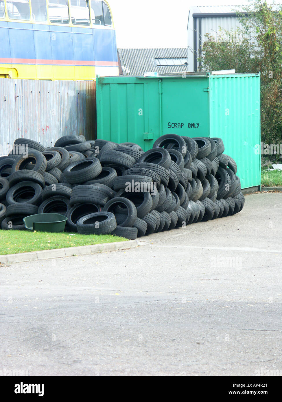Scrap Tyres on Industrial Estate Stock Photo - Alamy