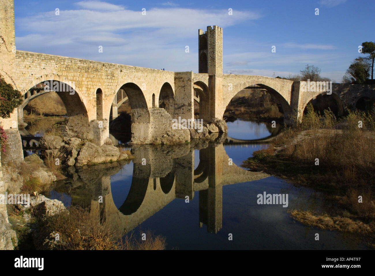The fortified medieval bridge at Besalu, Catalonia, Spain Stock Photo ...