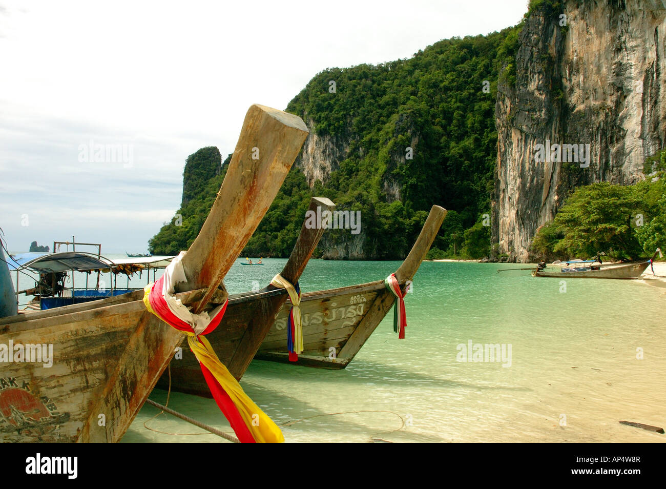 Long wooden colourful boats hi-res stock photography and images - Alamy
