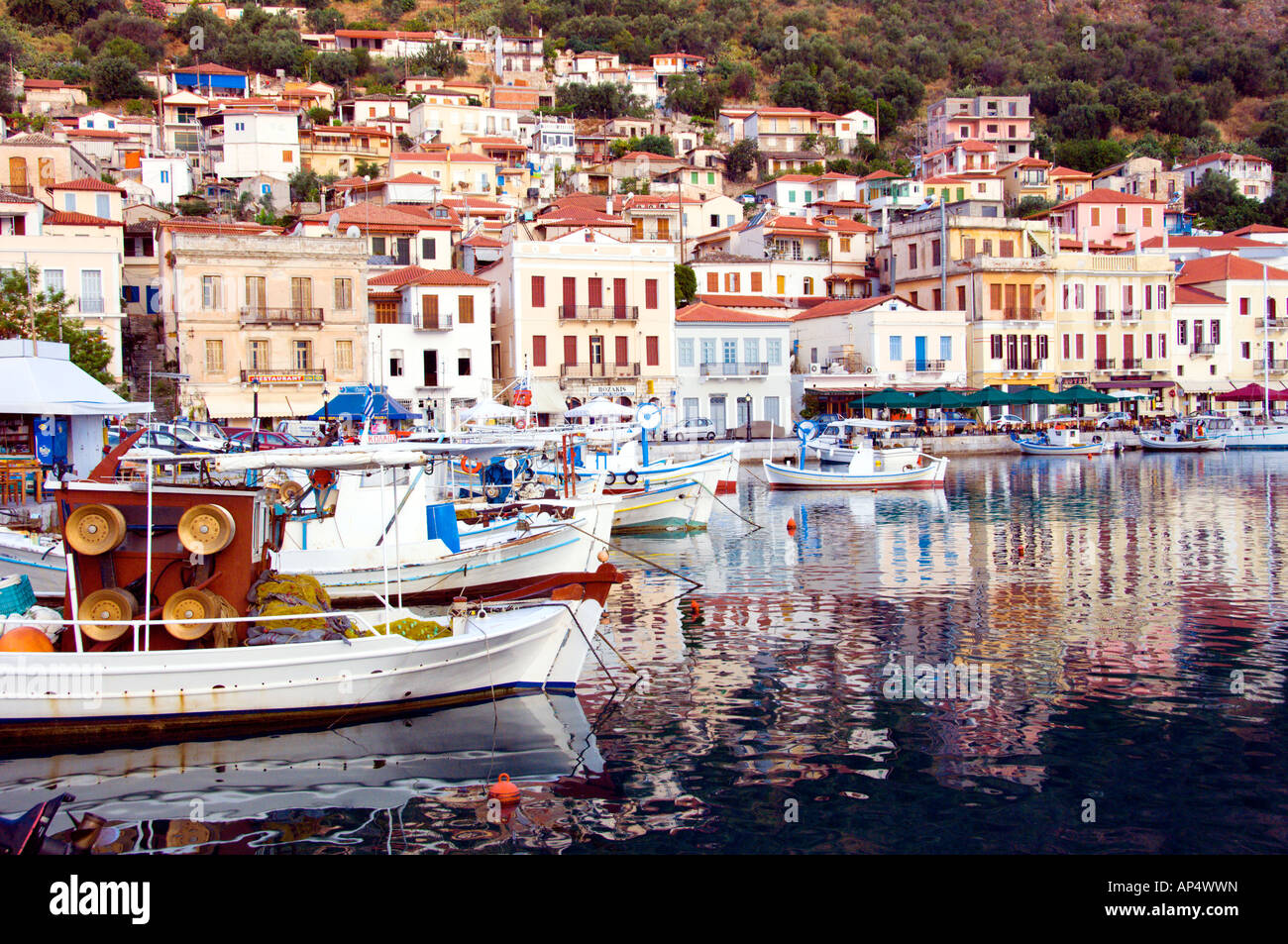Pastel colored buildings on the waterfront and colorful fishing boats ...