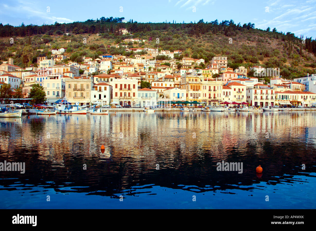 Pastel colored buildings on the waterfront and colorful fishing boats ...