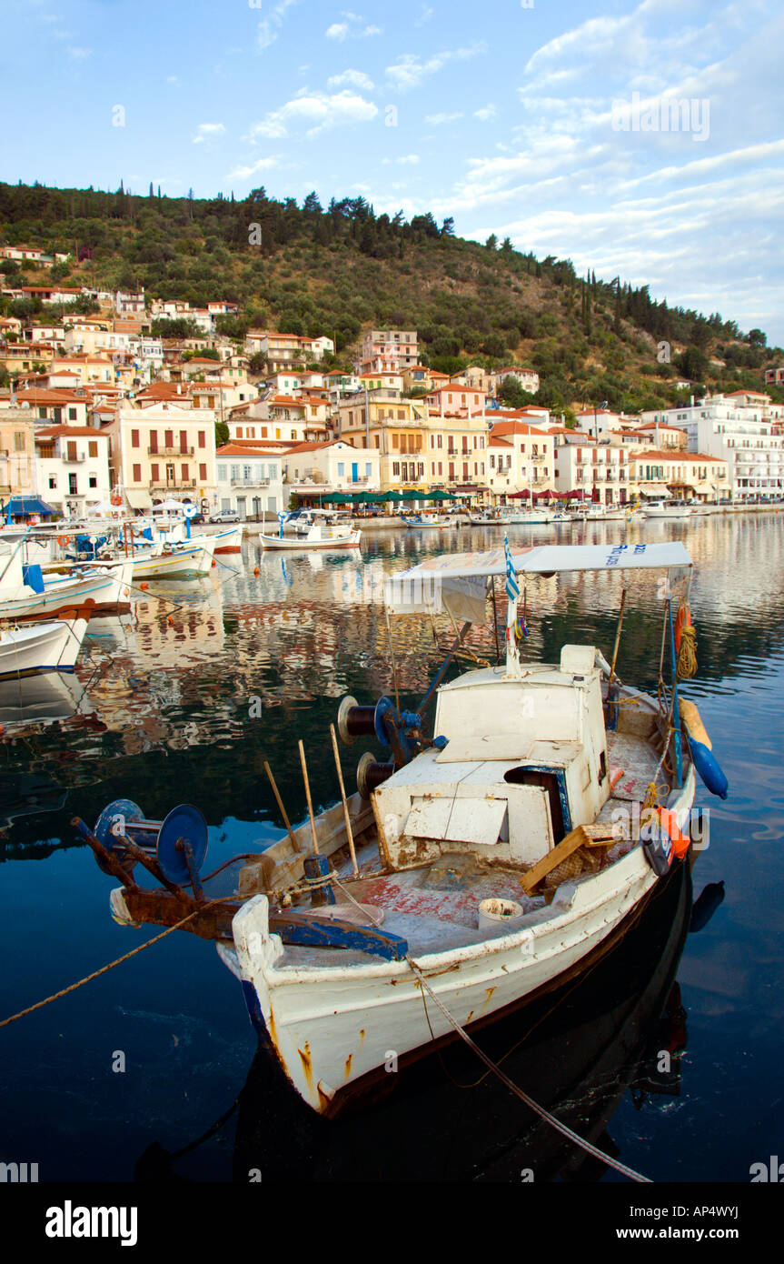 Pastel colored buildings on the waterfront and colorful fishing boats ...