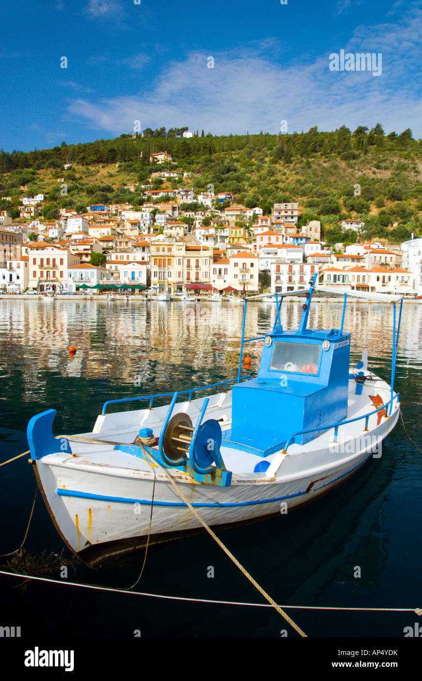 Pastel colored buildings on the waterfront and colorful fishing boats ...