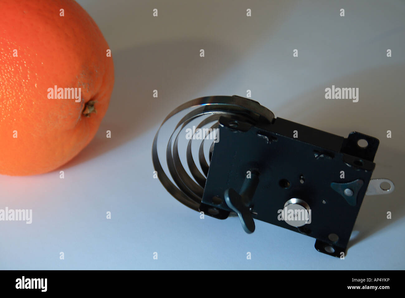 Orange and Clockwork Motor Stock Photo - Alamy