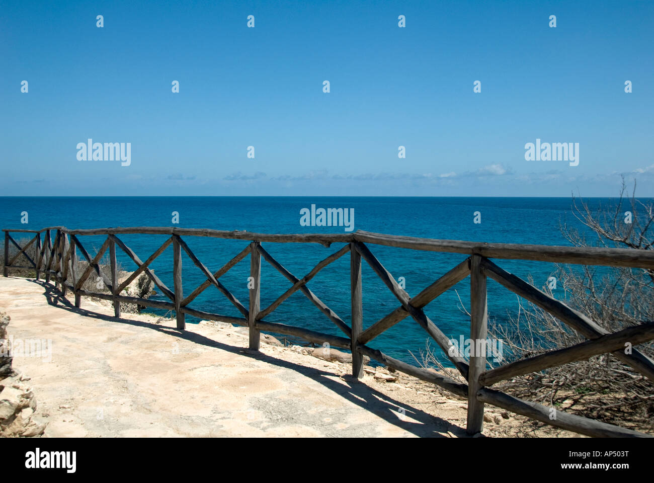 a seascape with a fence Stock Photo - Alamy