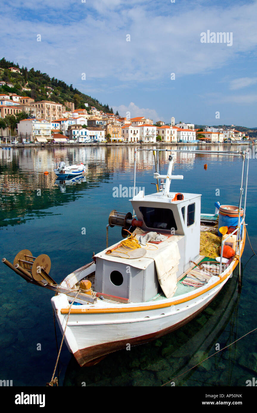 Pastel colored buildings on the waterfront and colorful fishing boats ...